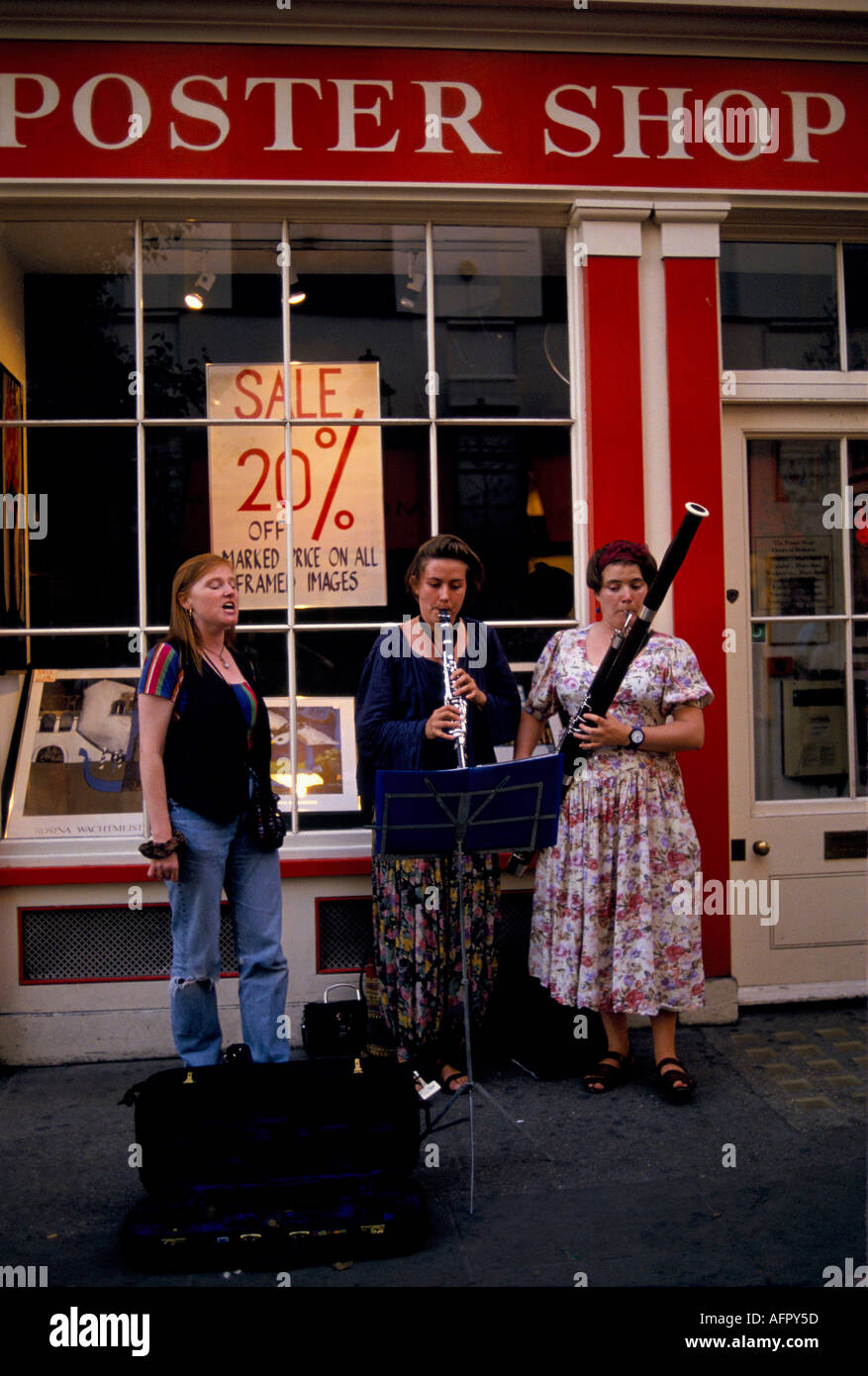 Buskers in "Covent Garden" central London England. Provide free musical ...