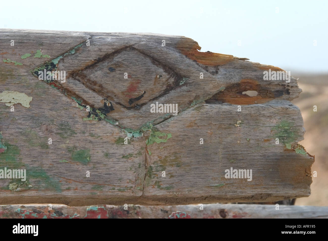 Symbolism. Greek symbol for good luck carved on a fishing boat Stock ...