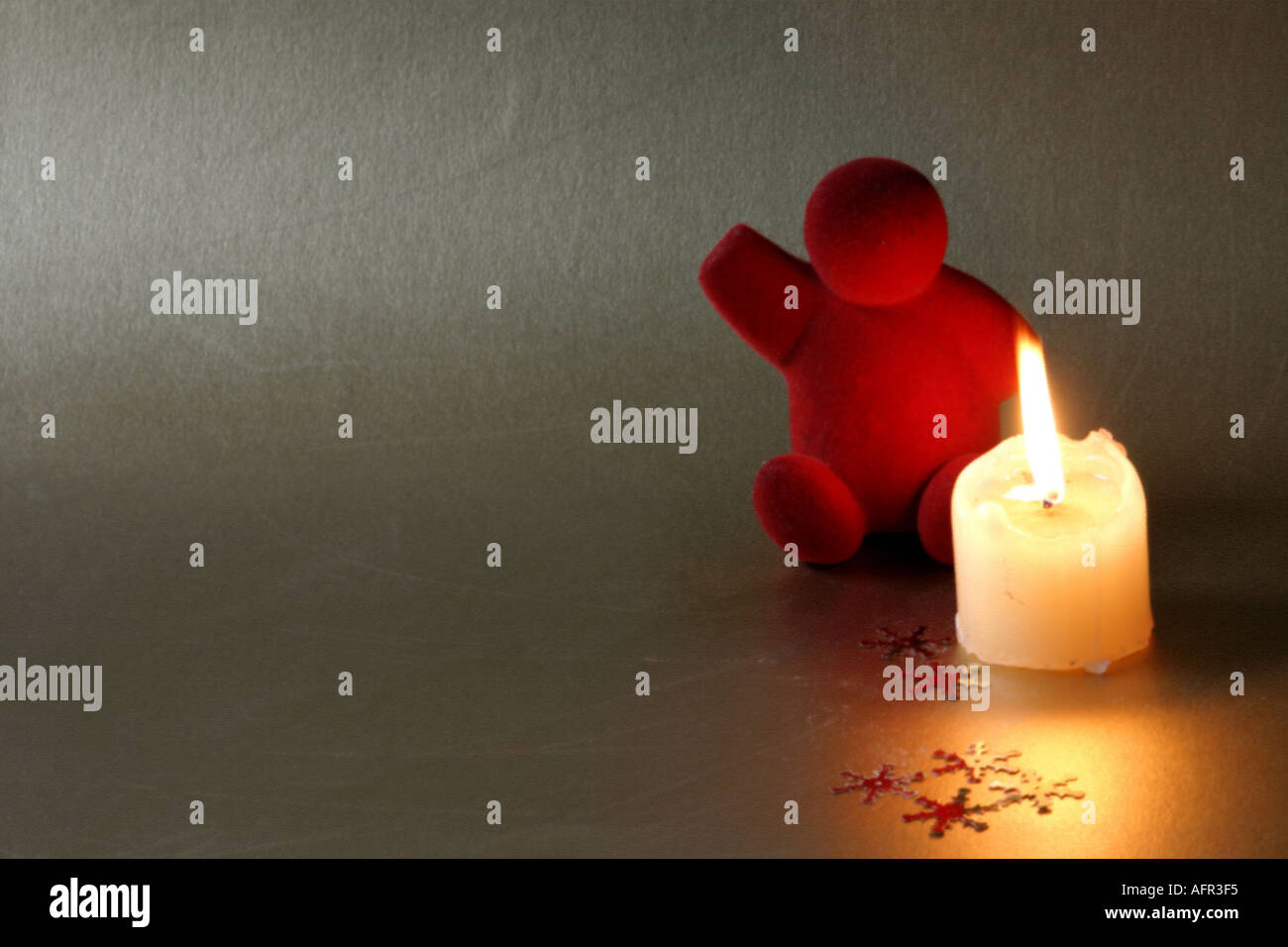 Christmas candle with puppet Stock Photo - Alamy
