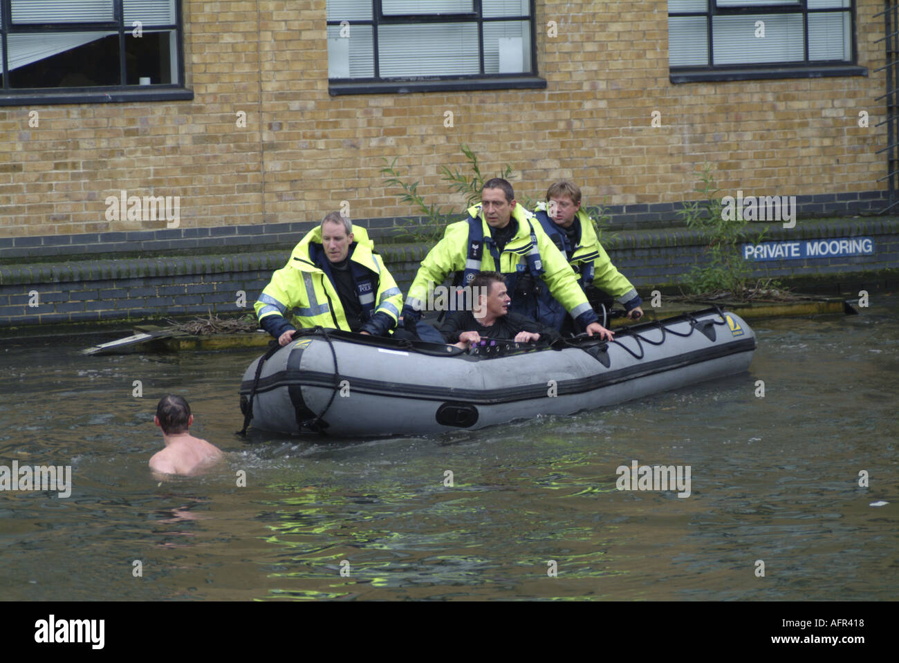 Police diving team trying to prevent a protestor crossing at the Regent ...