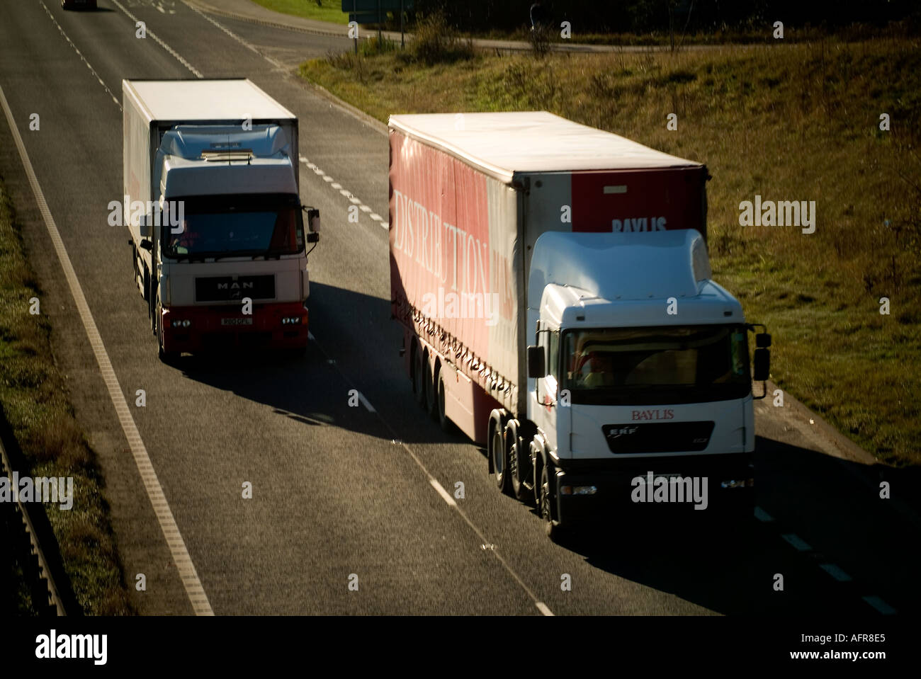 lorry truck at speed on motorway driver transport haulage distribution ...