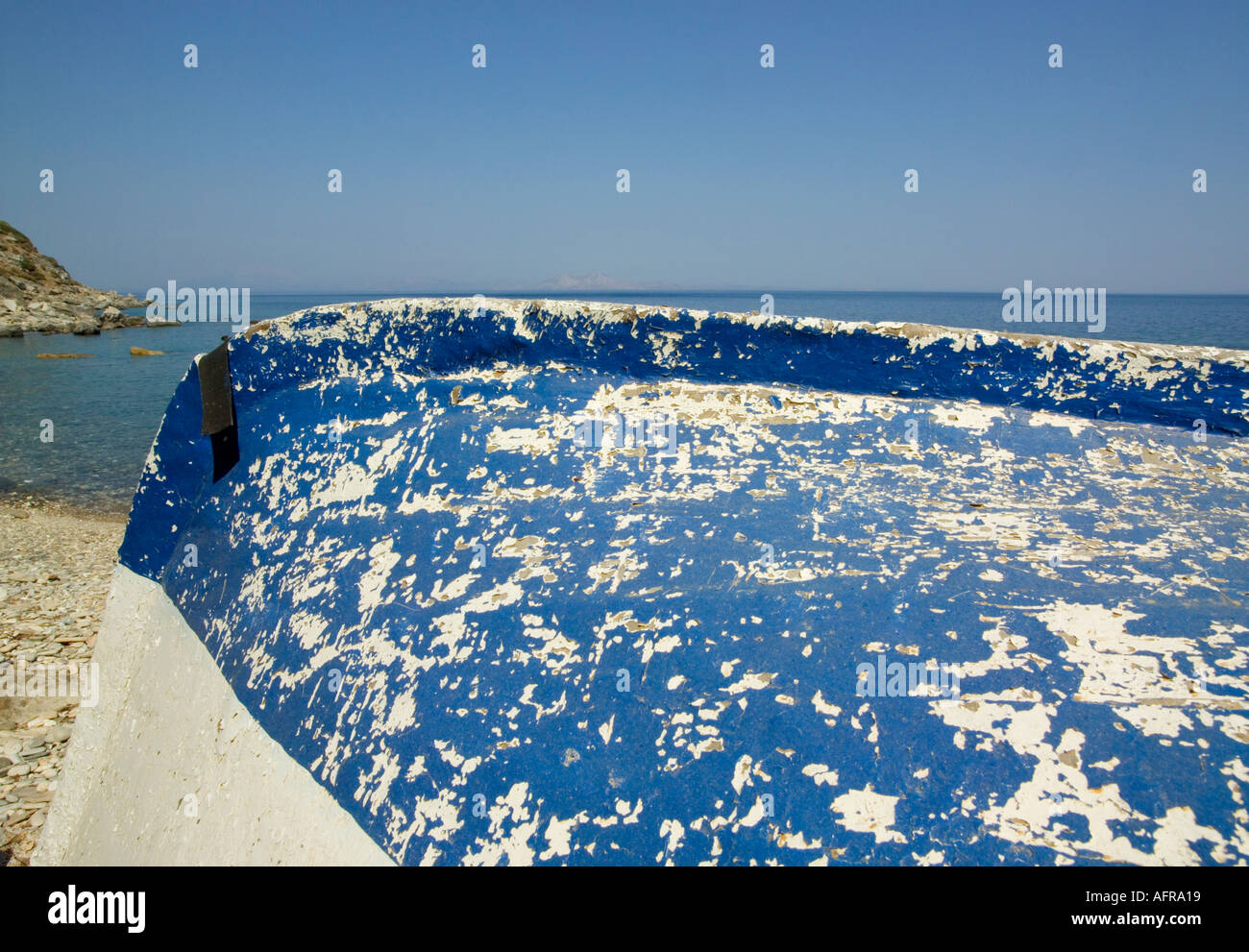 Upturned boat in Ikaria island Greece Stock Photo - Alamy