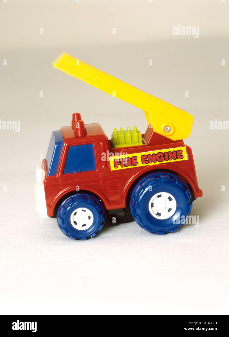 Toy plastic fire engine on white background Stock Photo - Alamy