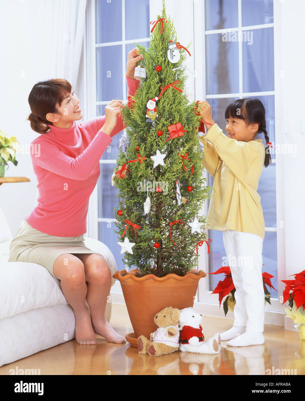 Family in Christmas Stock Photo - Alamy