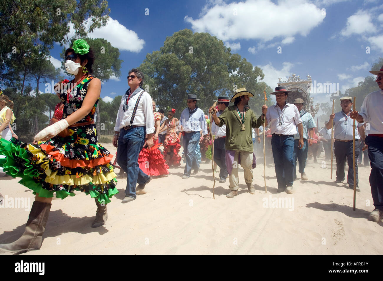Villamanrique pilgrims walking beside simpecado cart Stock Photo - Alamy