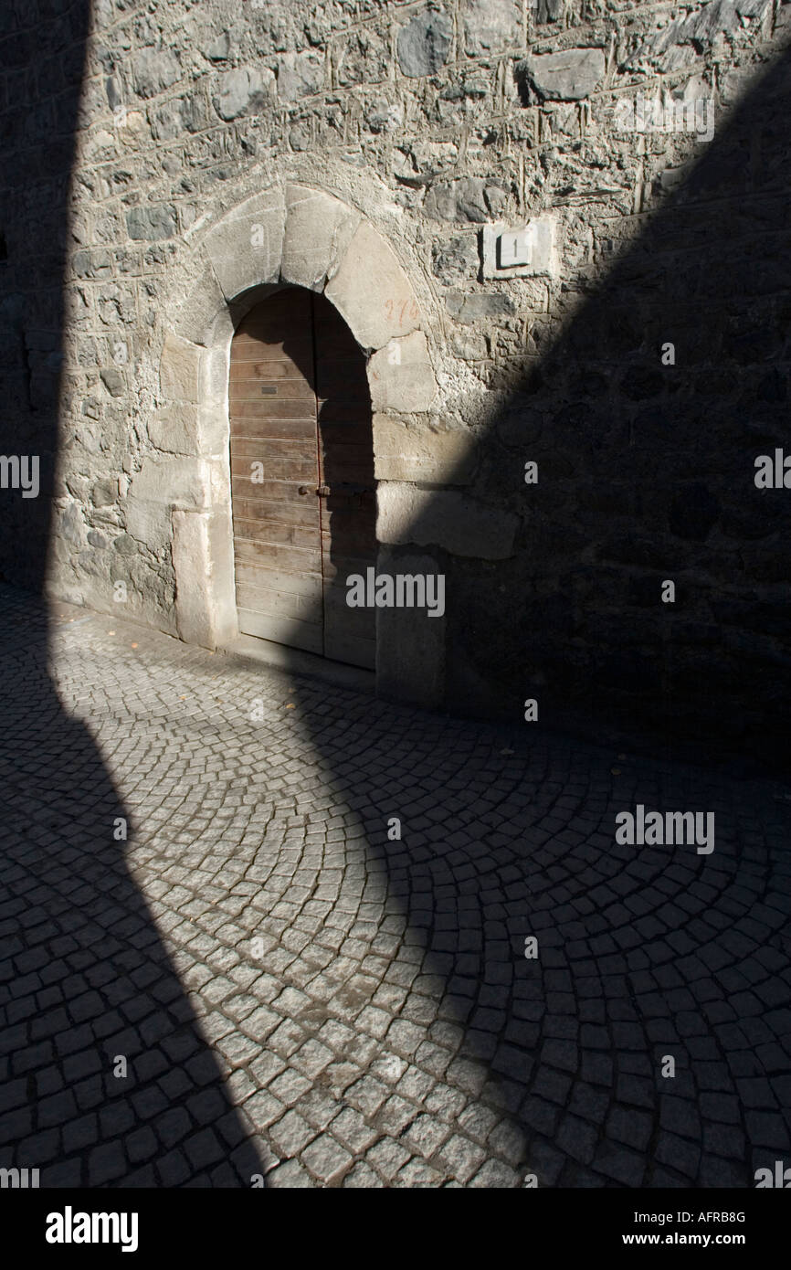 Cobbled street and stone building, Bormio, Italy Stock Photo - Alamy