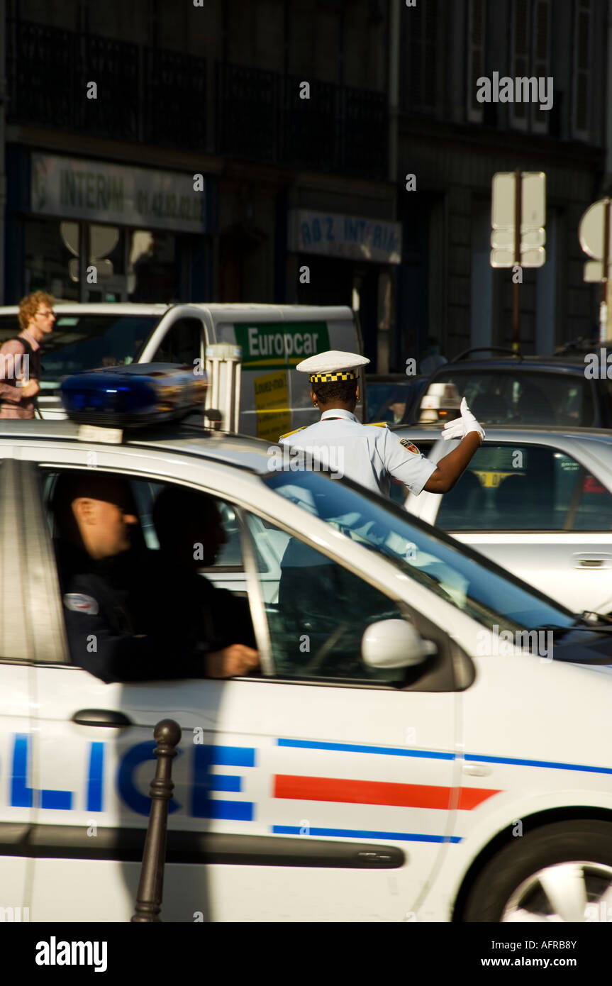 police woman directing traffic in paris street Stock Photo - Alamy