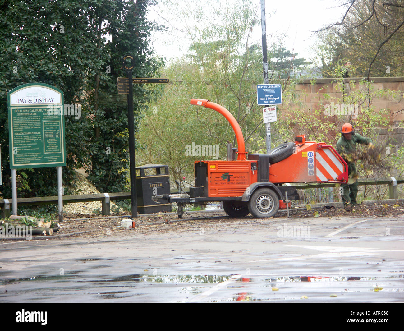 Wood Tree Branch chipper shredding machine Stock Photo - Alamy