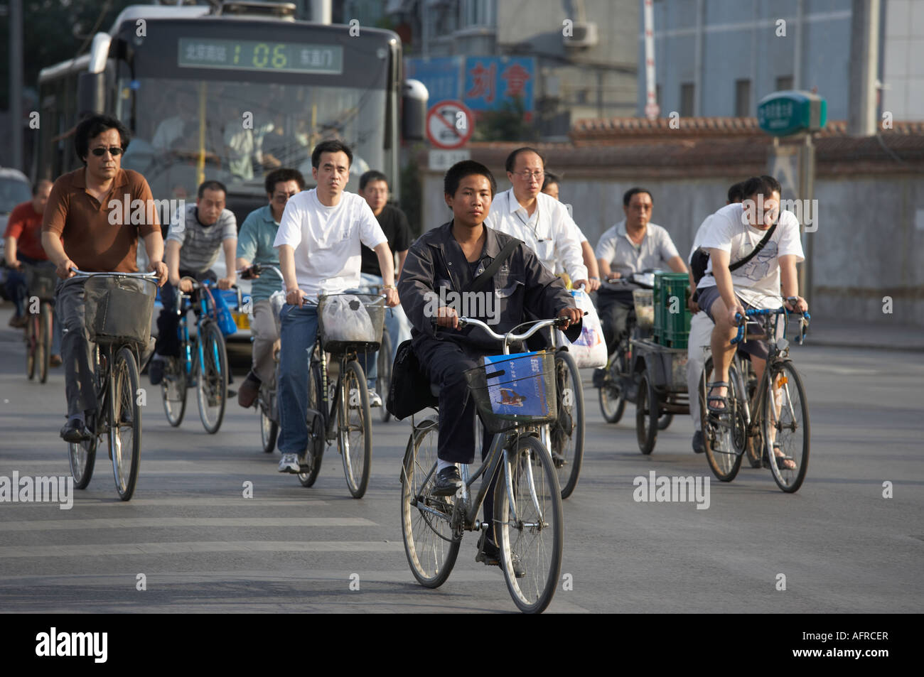 Cyclists and traffic, Beijing, China Stock Photo - Alamy