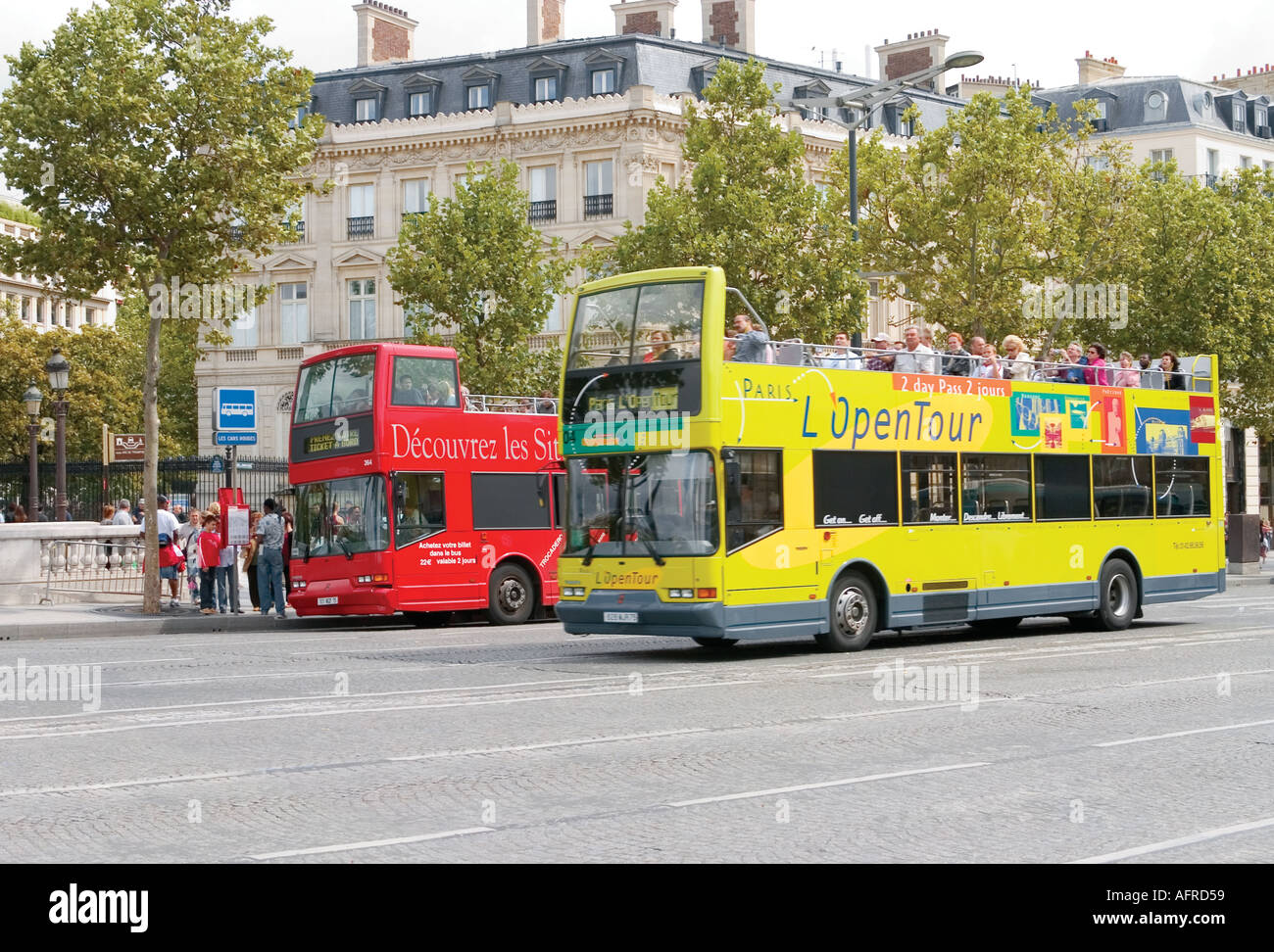 Red and yellow double, open top, sightseeing buses, transporting ...