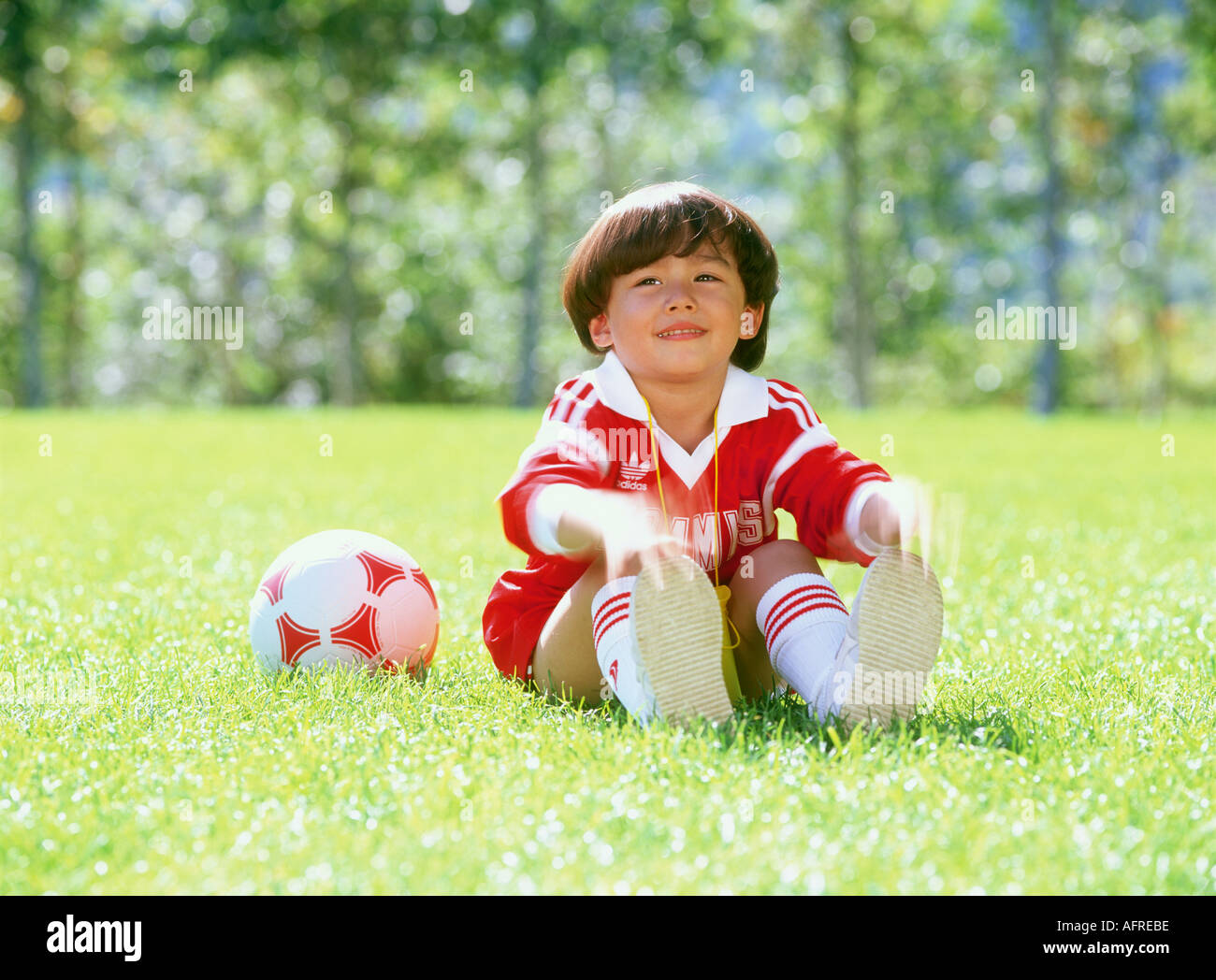 Boy in Soccer Wear Stock Photo - Alamy