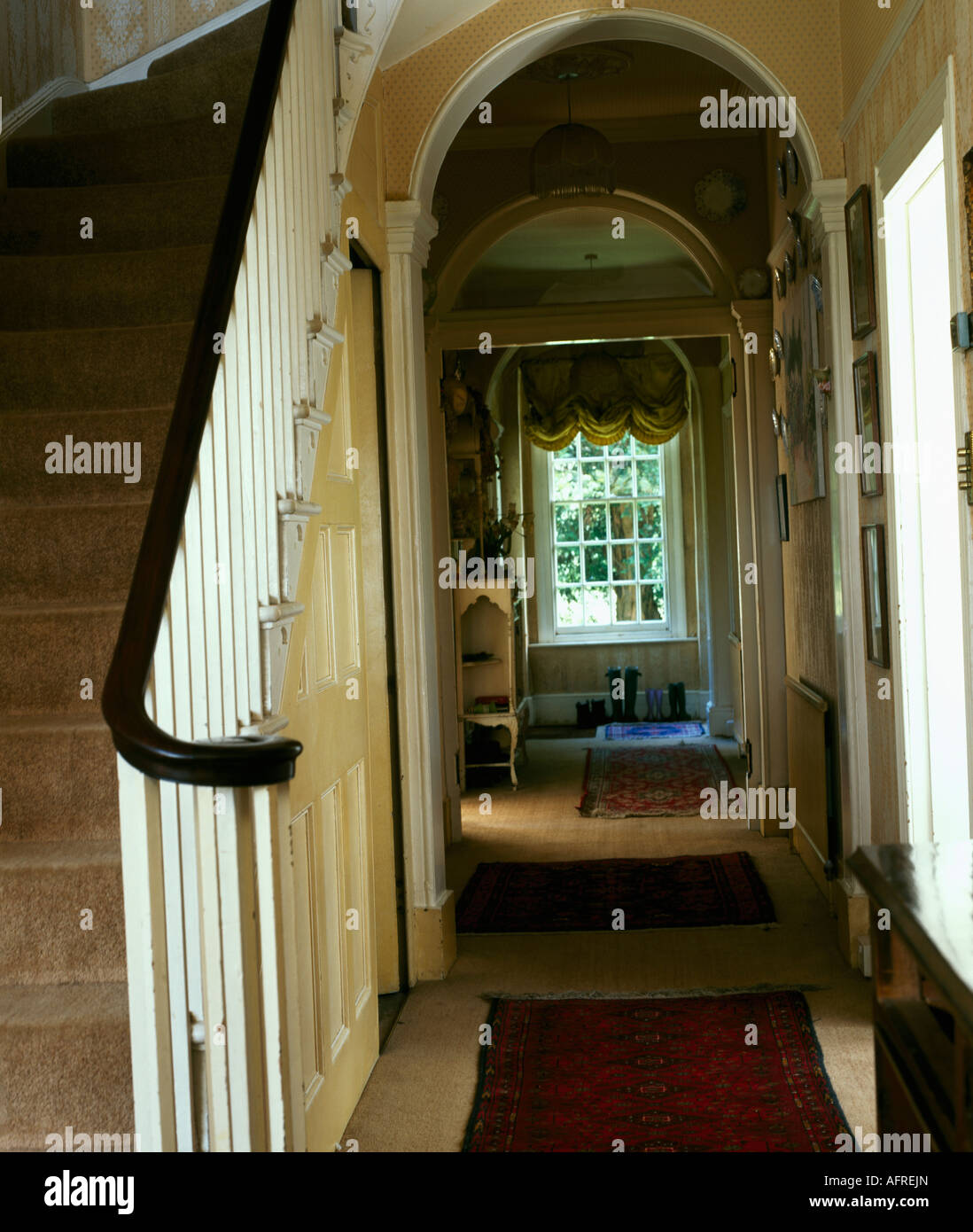 Hall in Georgian house with view to window overlooking the garden Stock ...