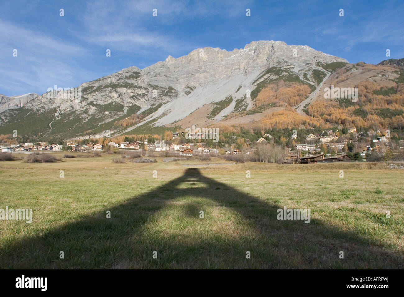 Shadow cast by the tower of La Chiesa di S.Gallo, Bormio, Italy. See ...