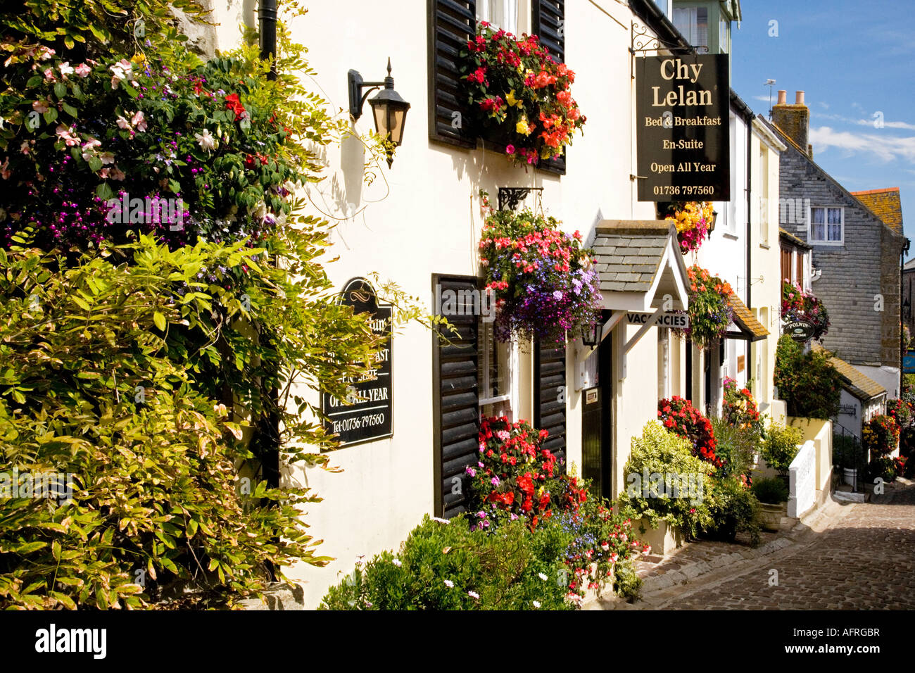 Hotel on cobbled street,Cornwall,England,UK Stock Photo - Alamy