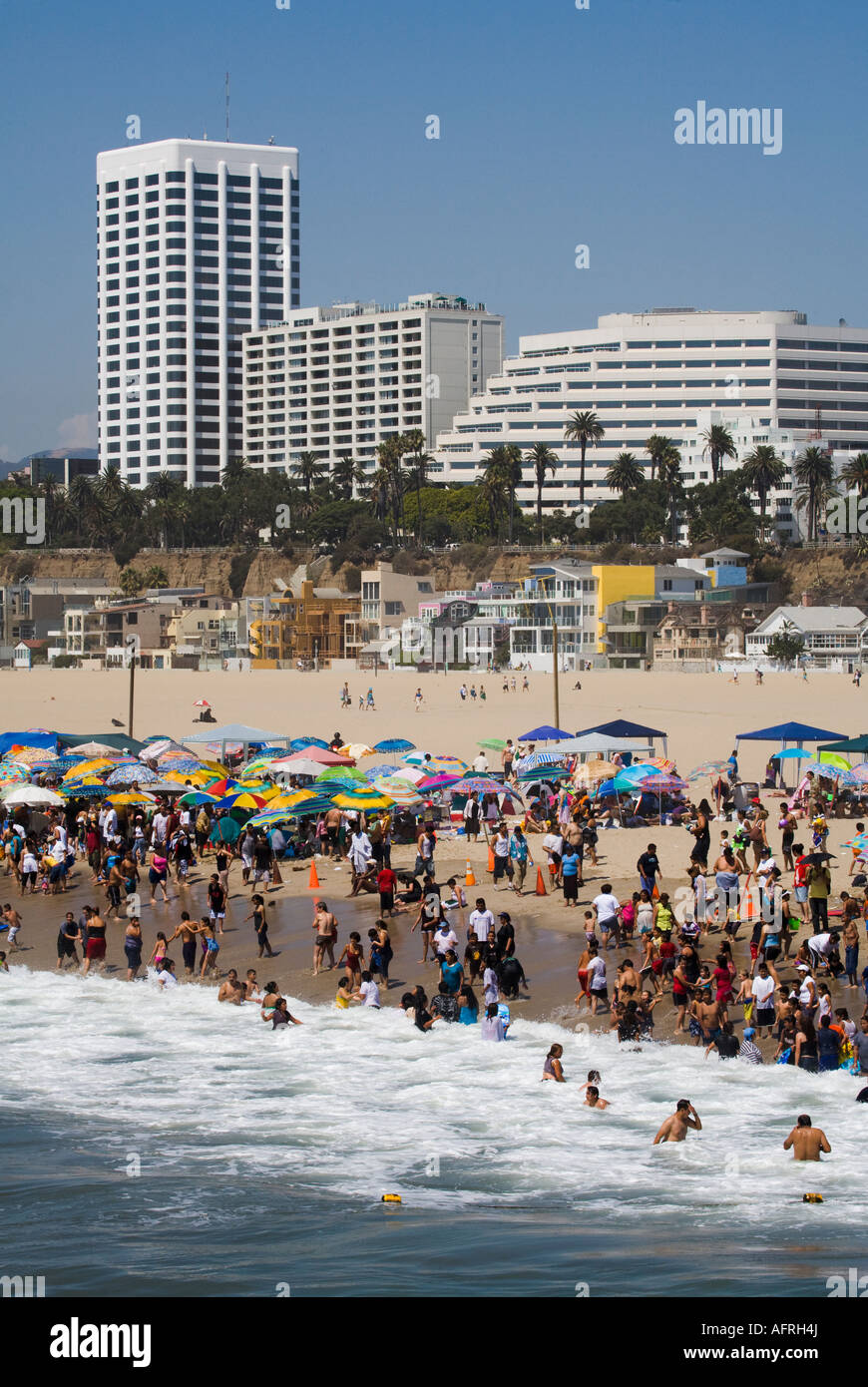 crowds enjoying the beach on Labor Day Stock Photo - Alamy