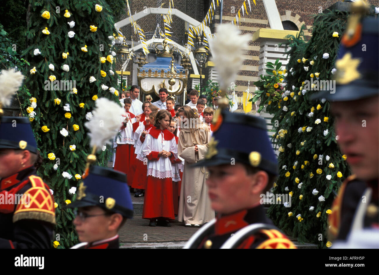 Netherlands Mechelen People at catholic Holy Communion procession Stock ...