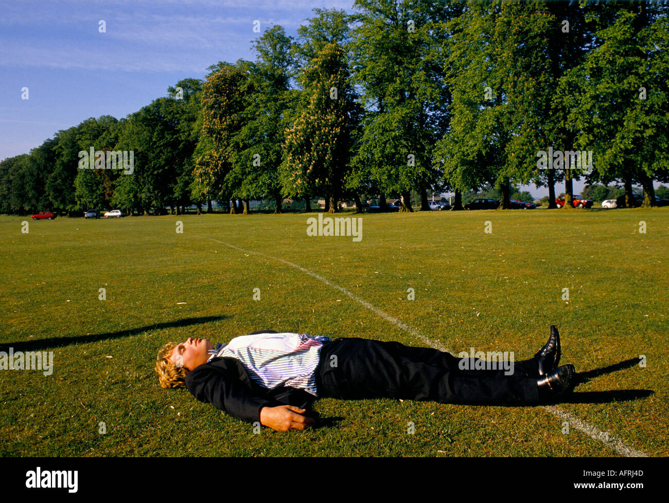 Drunk student lying passed out sleeping it off on the games playing ...