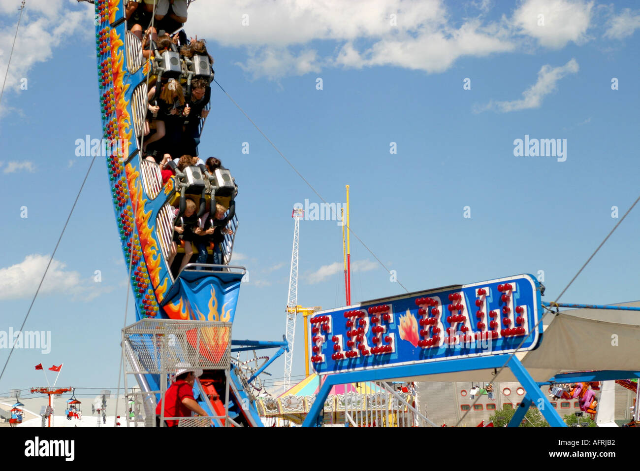 Whirling carnival rides hi-res stock photography and images - Alamy