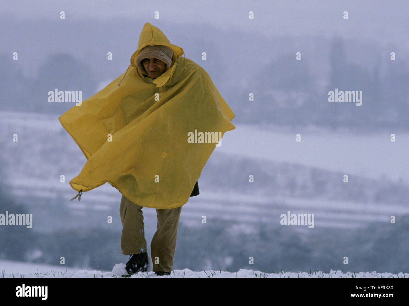 Windy weather man walking hi-res stock photography and images - Alamy