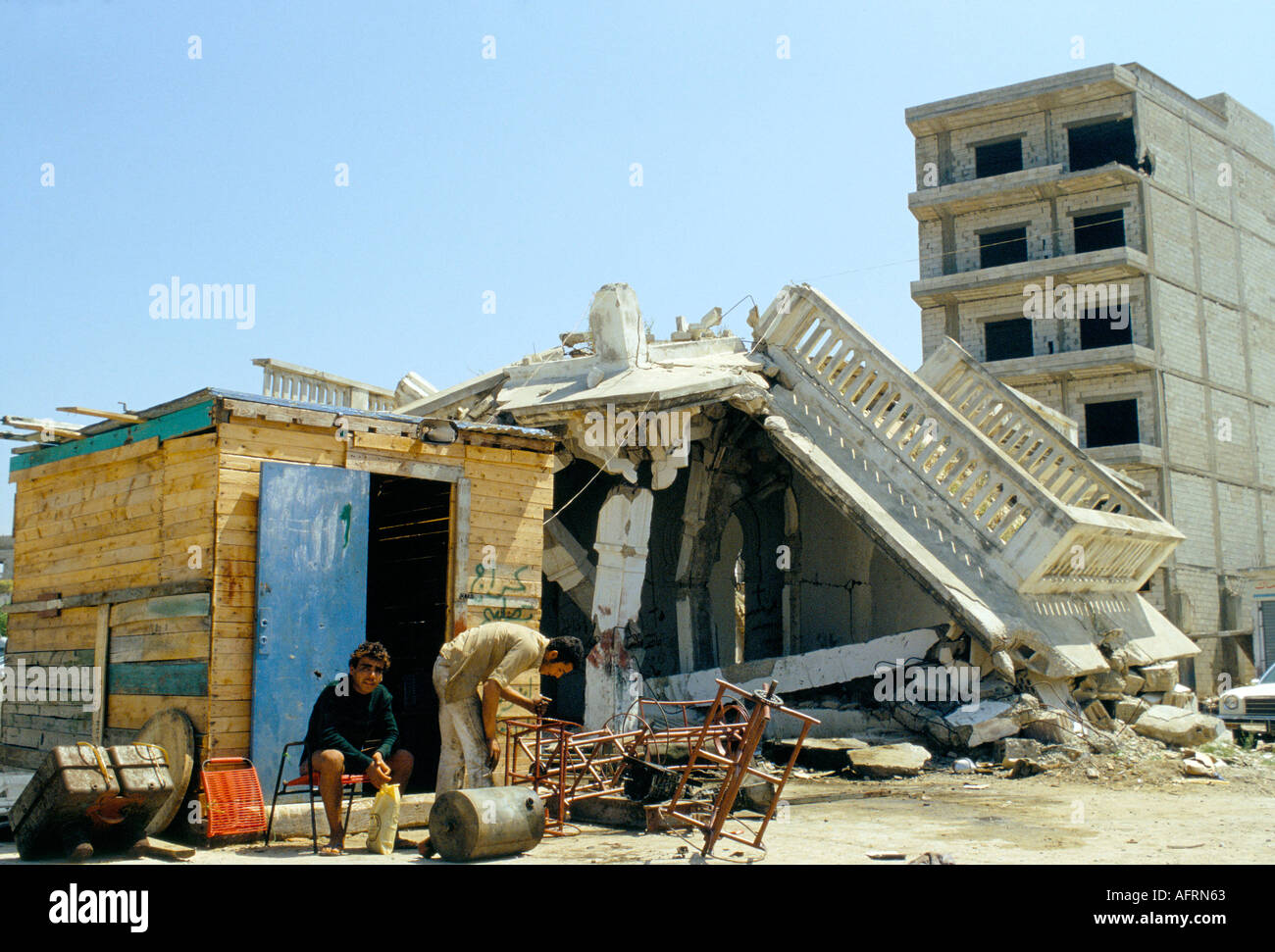 Tyre Southern Lebanon 1980. Israeli bomb damage. People getting back to ...