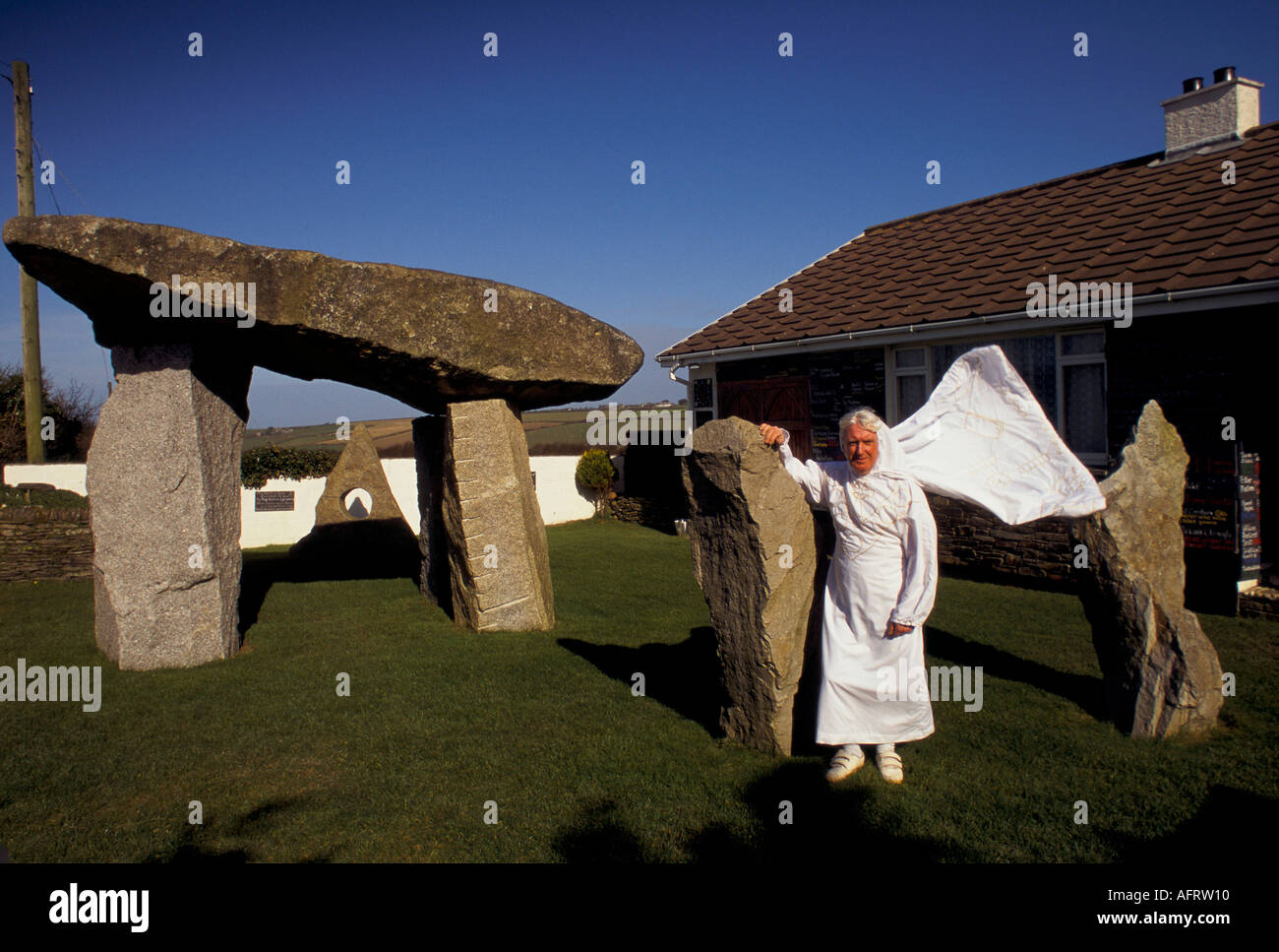 Ed Prynn, an eccentric druid in his Megalithic Garden, with copies ...