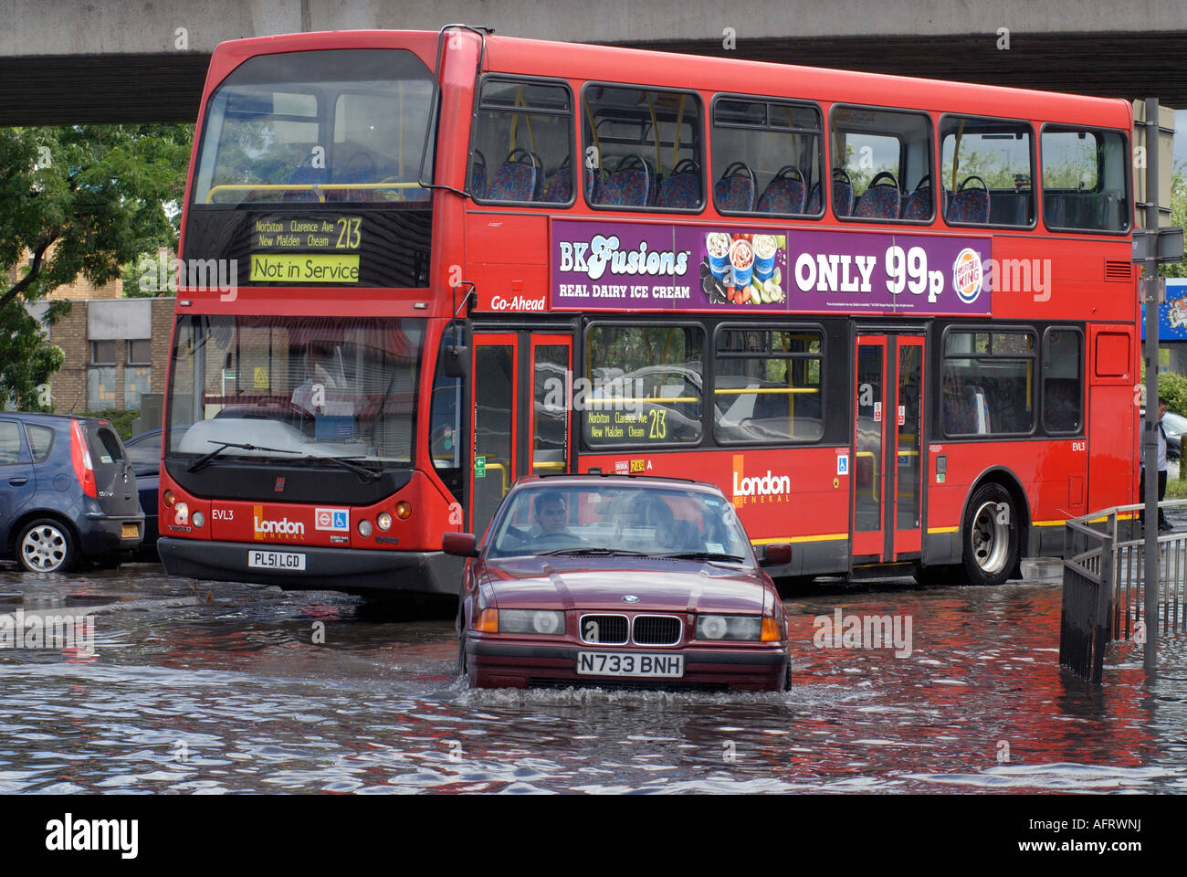 A stranded bus shortly after torrential rain and flash flooding caused ...