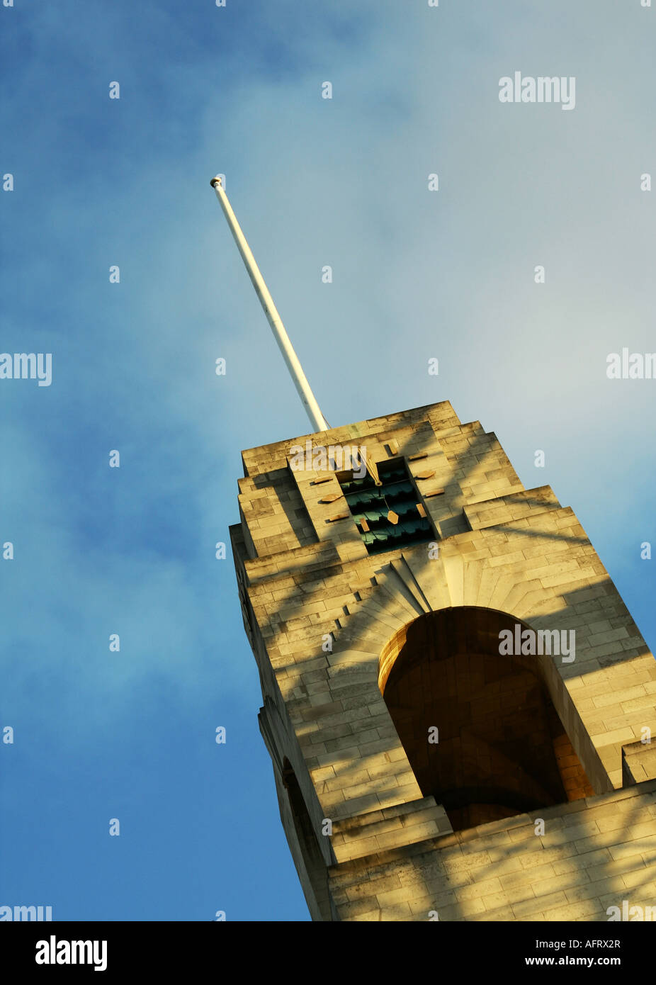 Shadowed building in light Stock Photo - Alamy