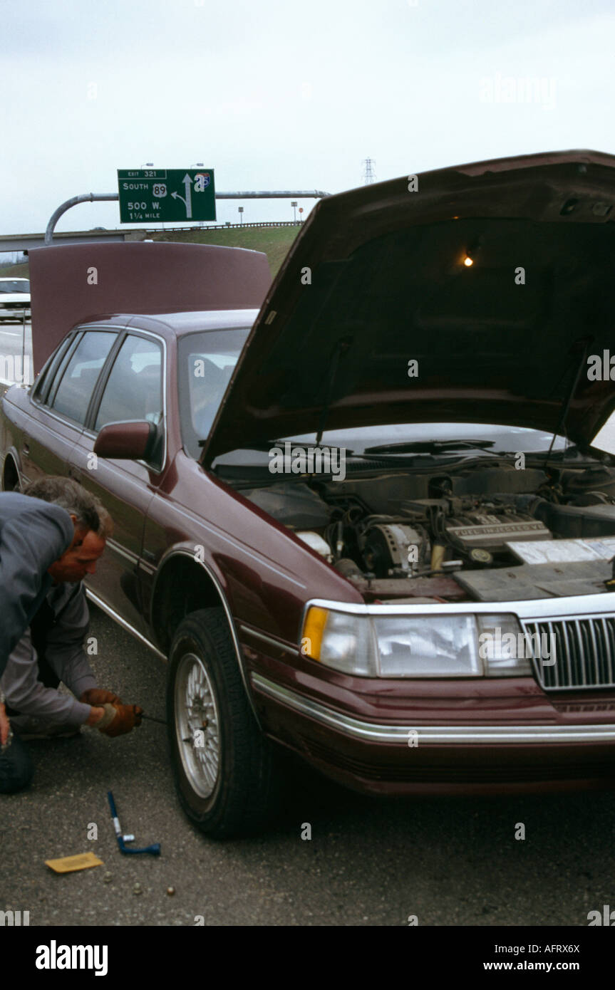 Utah Usa Breakdown On The Freeway Changing A Wheel Stock Photo - Alamy