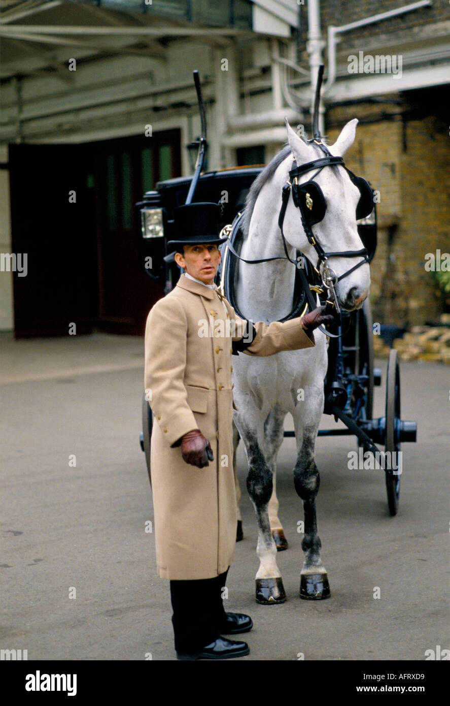 Coachman training horses for royal carriages Royal Mews Buckingham ...