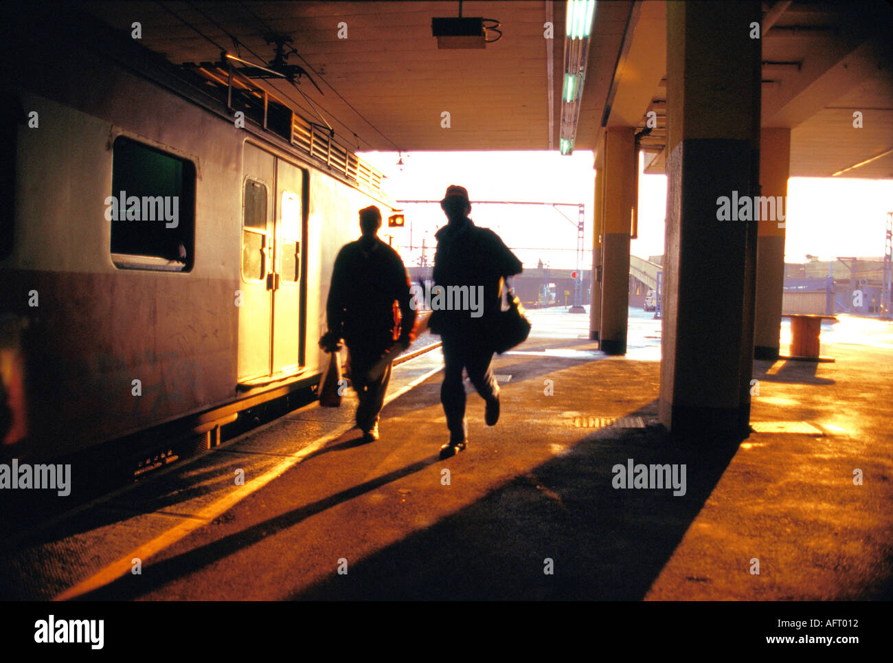 African men catching a train at Parkstation Johannesburg Gauteng South ...