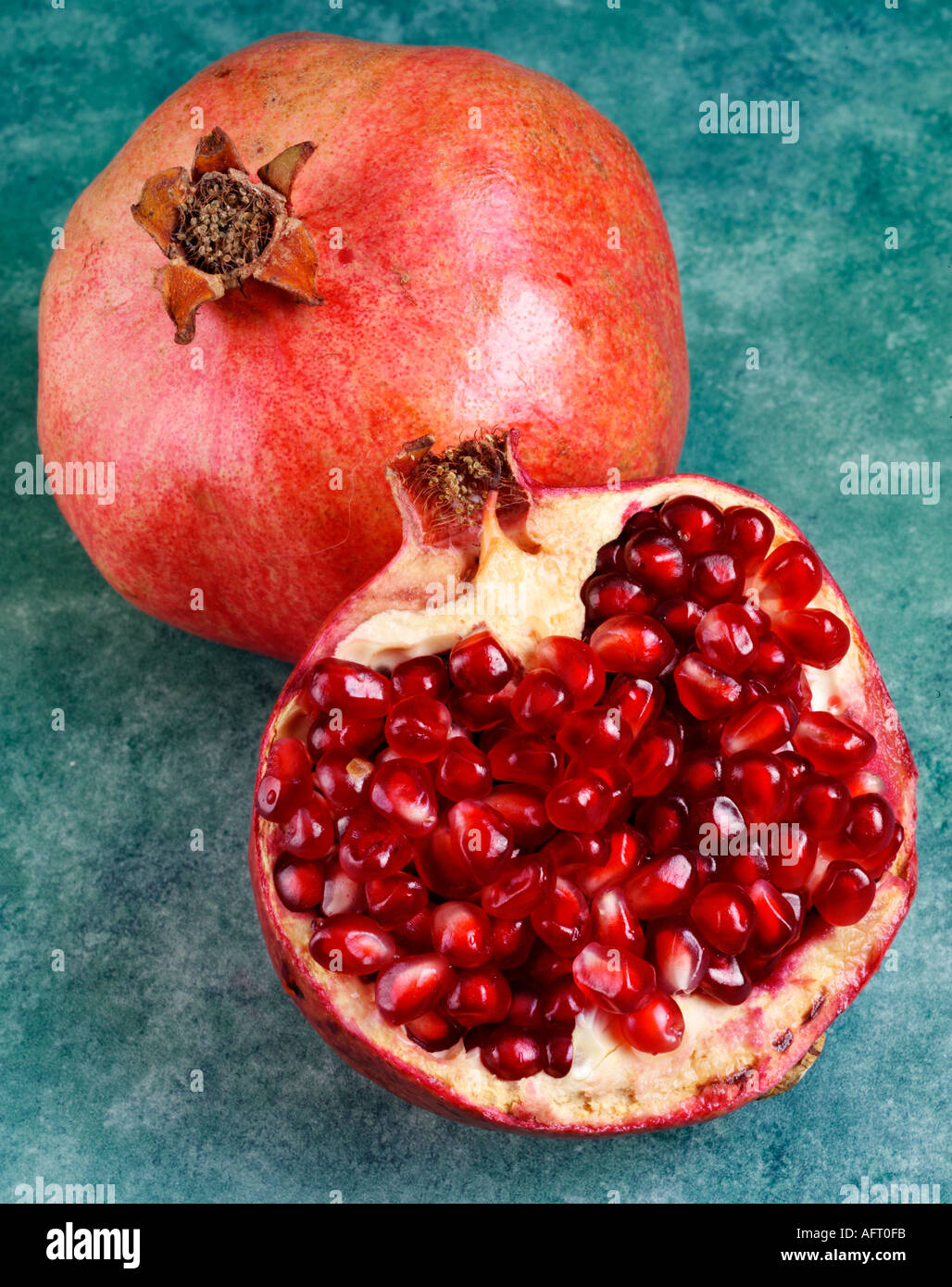 Whole half pomegranate seeds hi-res stock photography and images - Alamy