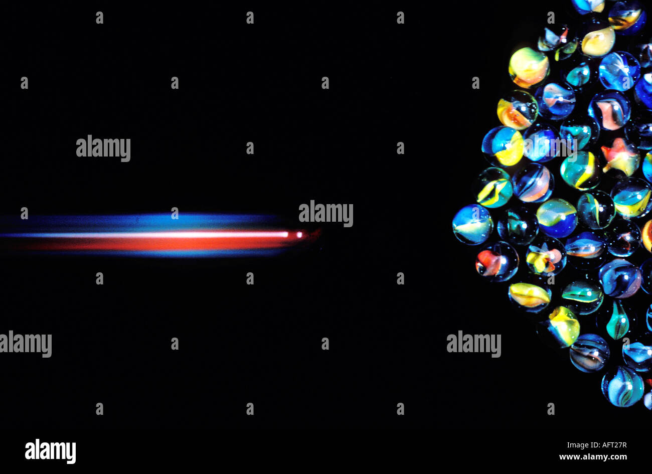 Marbles and shooter Stock Photo - Alamy