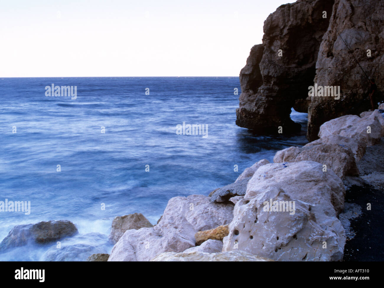 Rocks at Playa Moraig Spain Stock Photo - Alamy