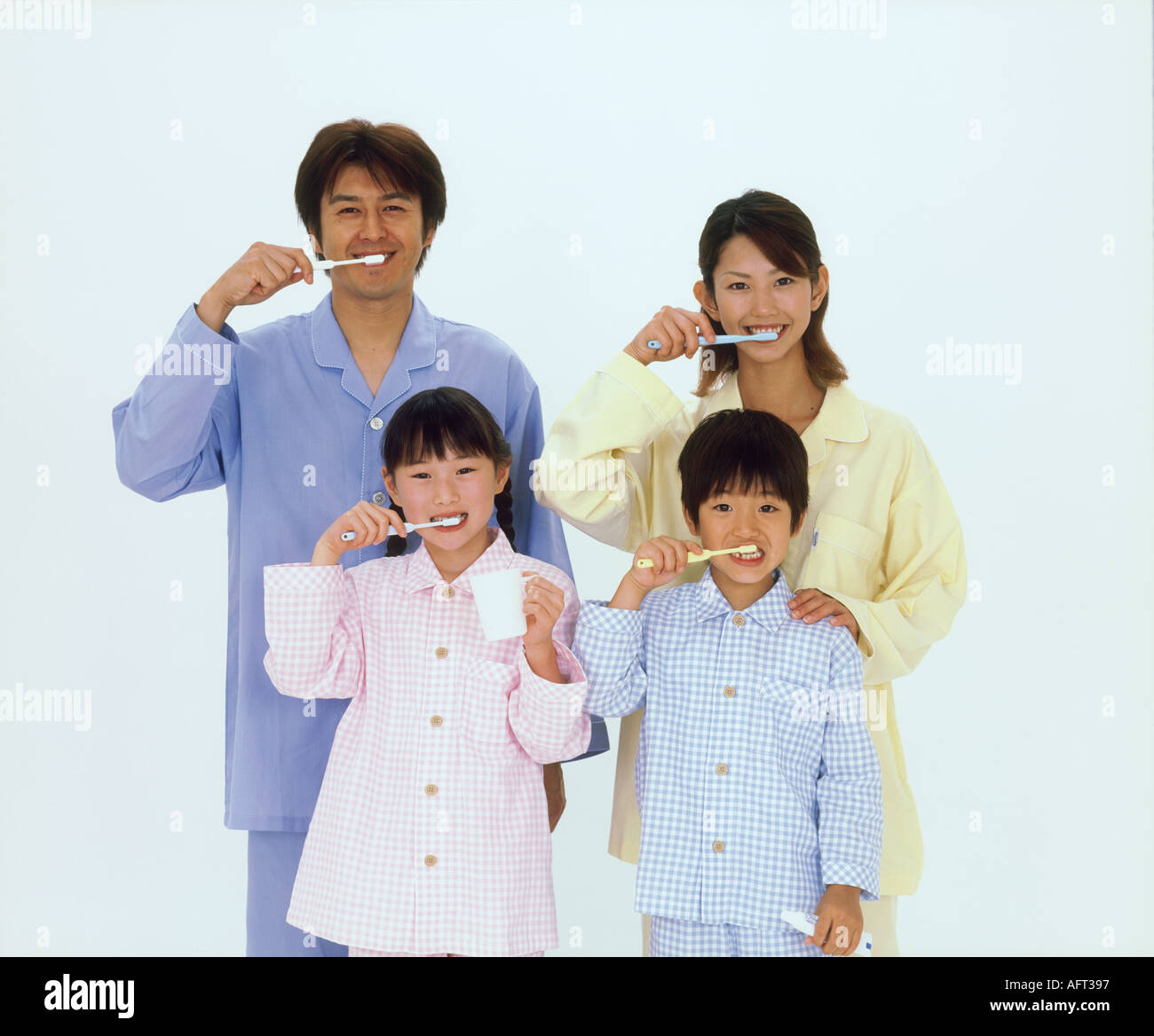 Family Brushing Tooth Stock Photo - Alamy