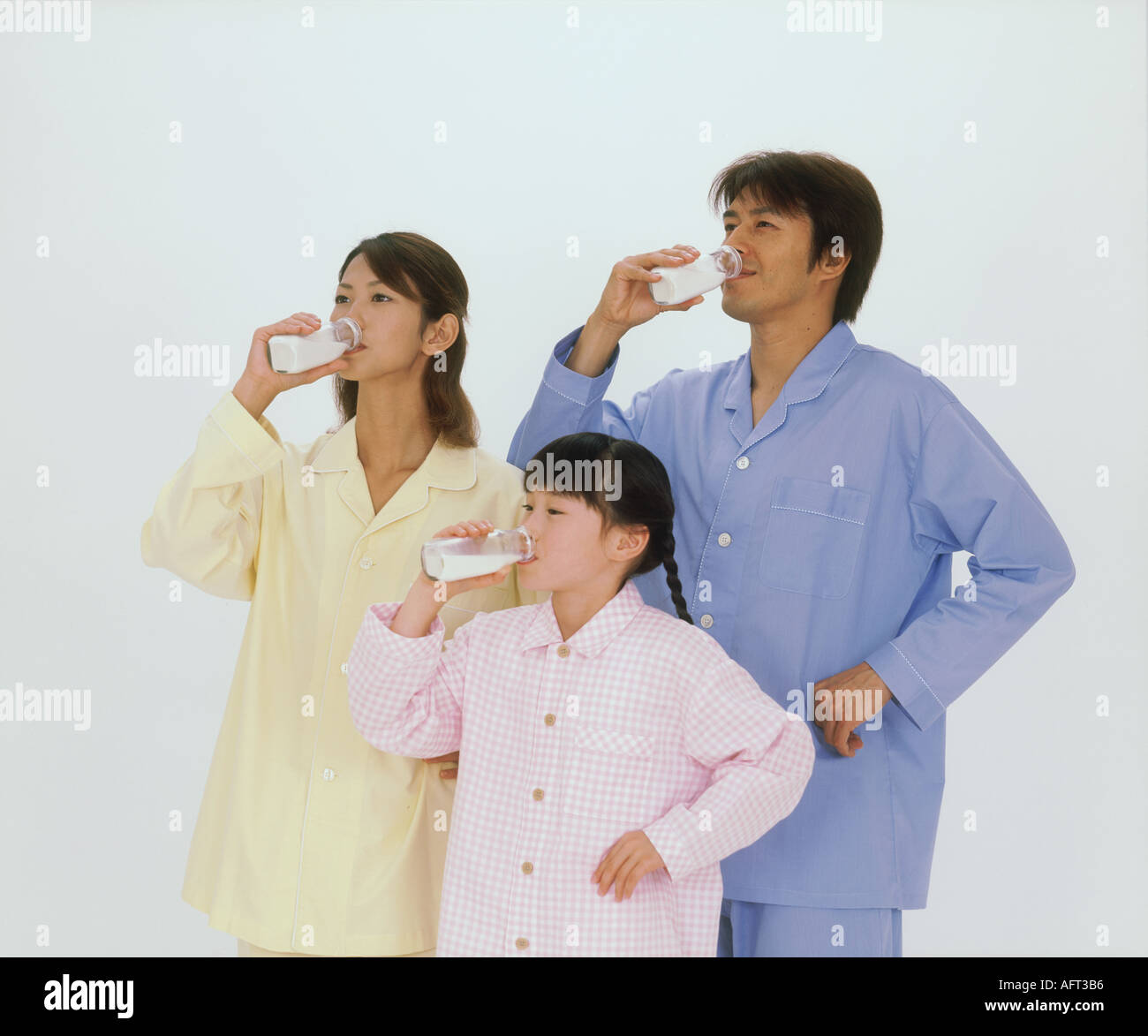 Family Drinking Milk Stock Photo - Alamy