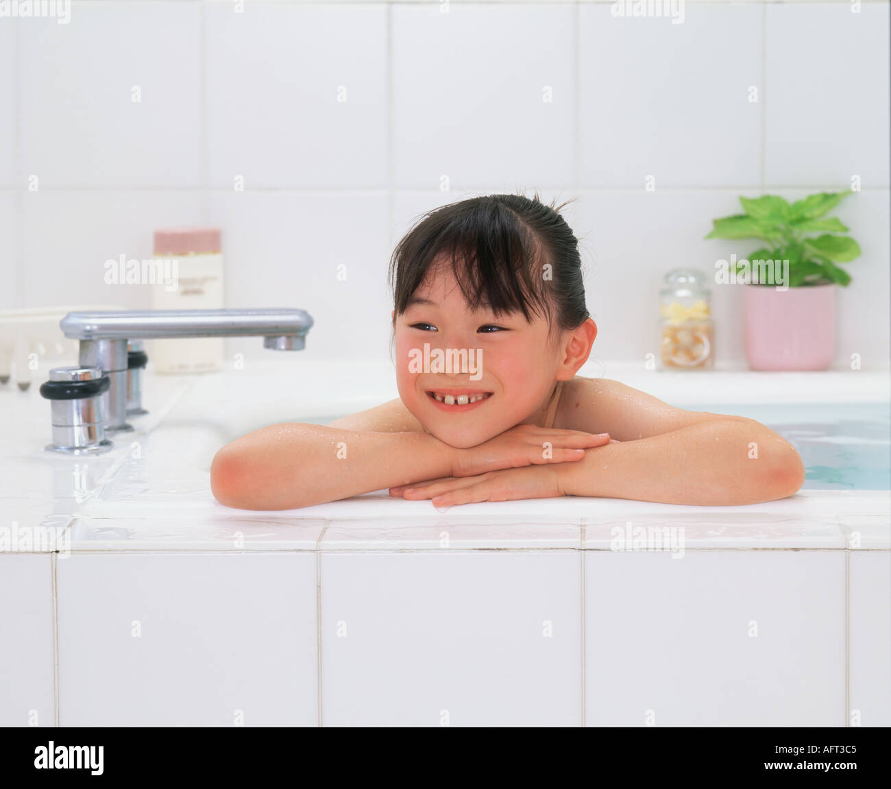 Girl Taking Bath Stock Photo - Alamy