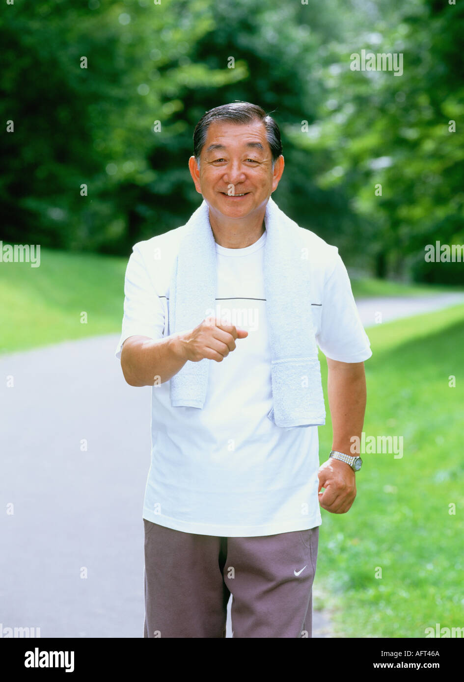 Elderly Man Walking Stock Photo - Alamy