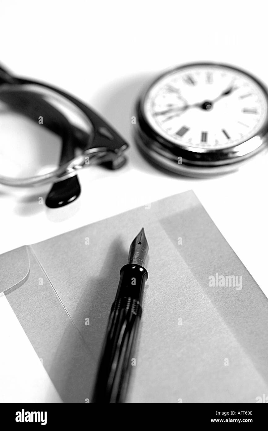 Time and Communication Concept Black and White Watch Eyeglasses Ink Pen ...