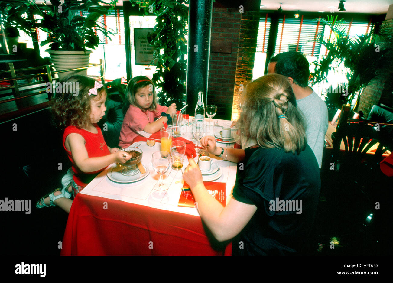 Family eating in a french restaurant hi-res stock photography and ...