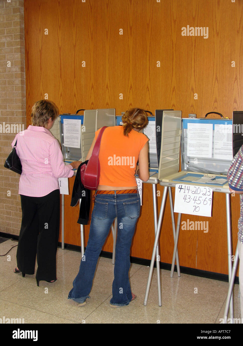 Woman votes booth hi-res stock photography and images - Alamy