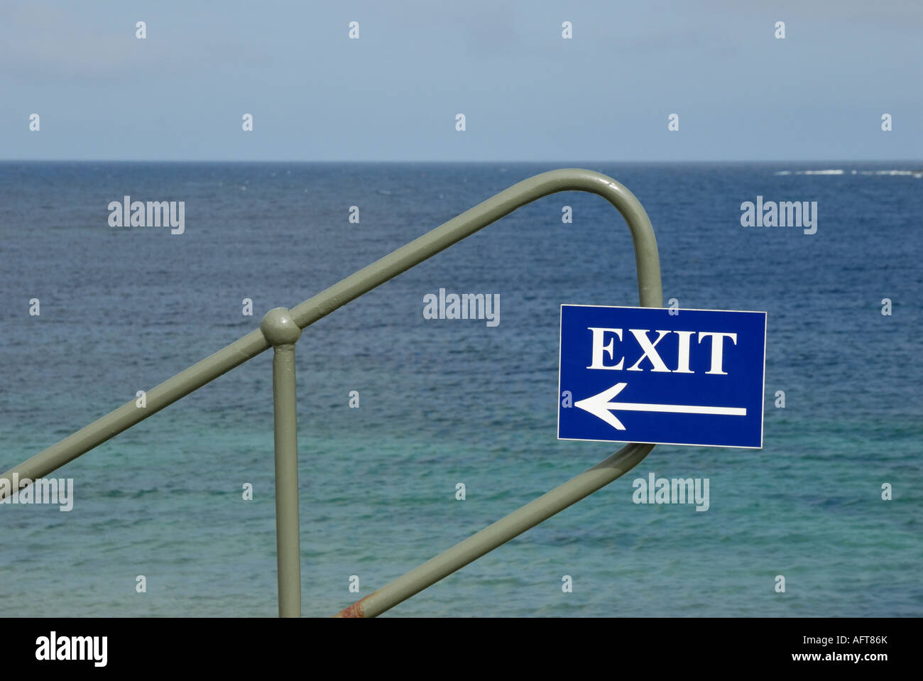 Exit sign by the sea Stock Photo - Alamy