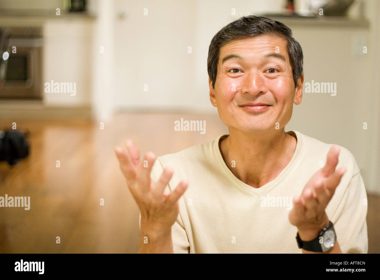Older Man Talking with his Hands Stock Photo - Alamy
