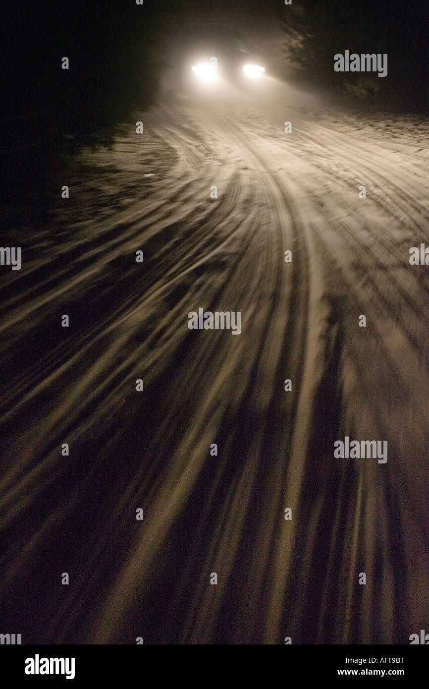 Off-road vehicles lighting a sandy road with its headlights Stock Photo ...