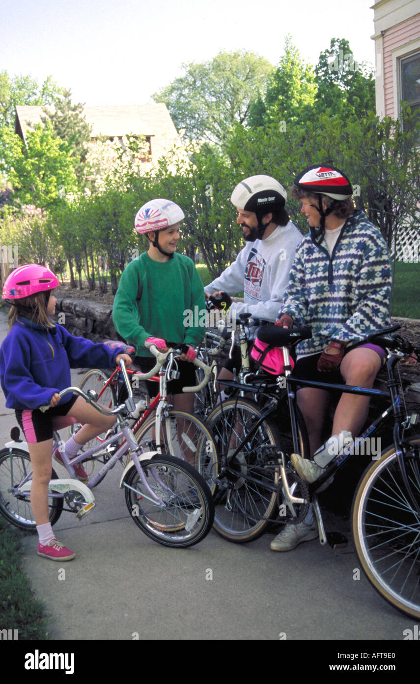 Dad and children biking hi-res stock photography and images - Alamy