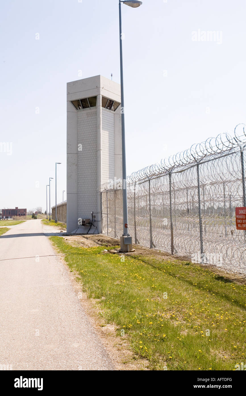 Perimeter fence and guard tower at the Lincoln Correctional Center ...