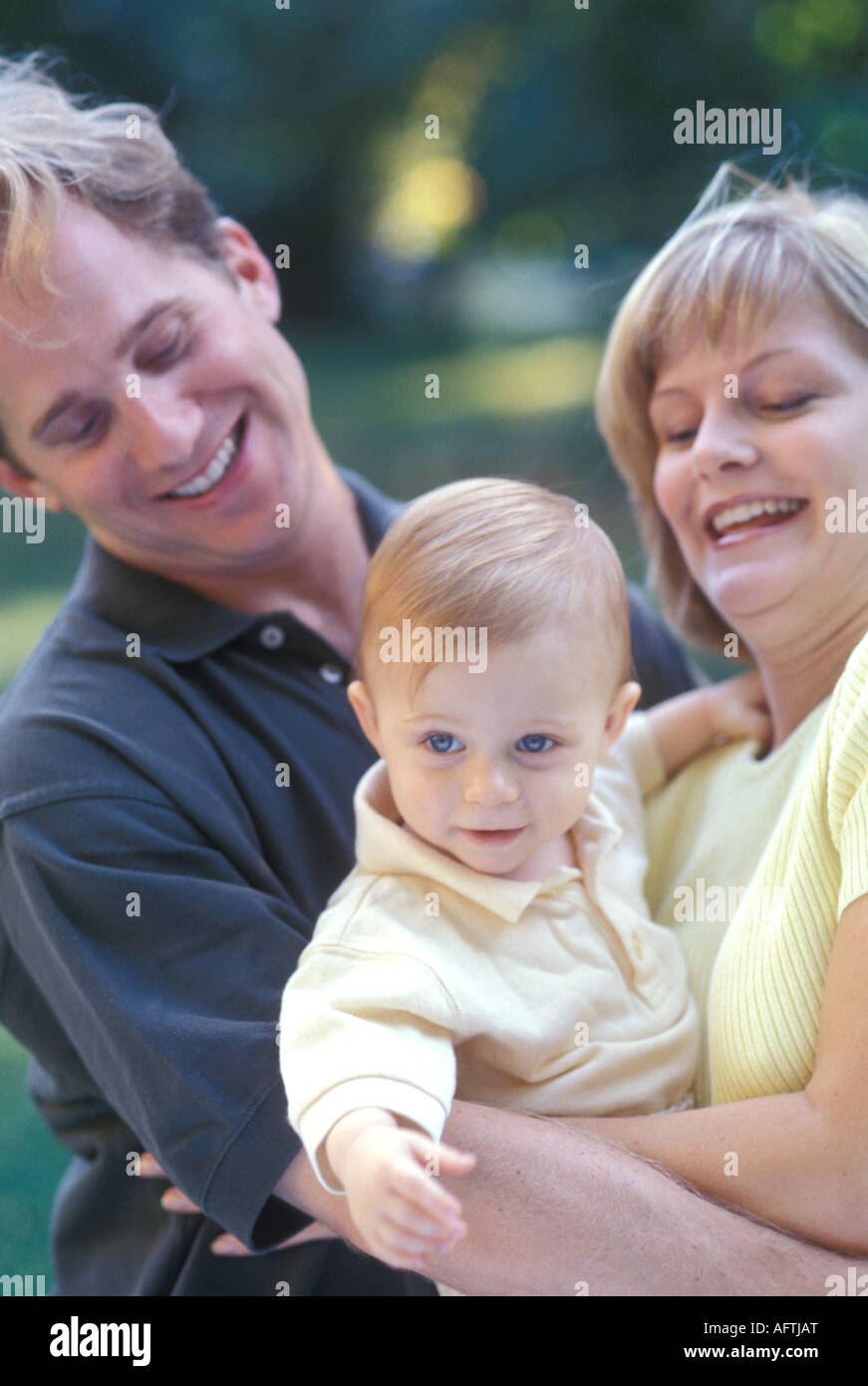 Cheerful family, smiling Stock Photo - Alamy
