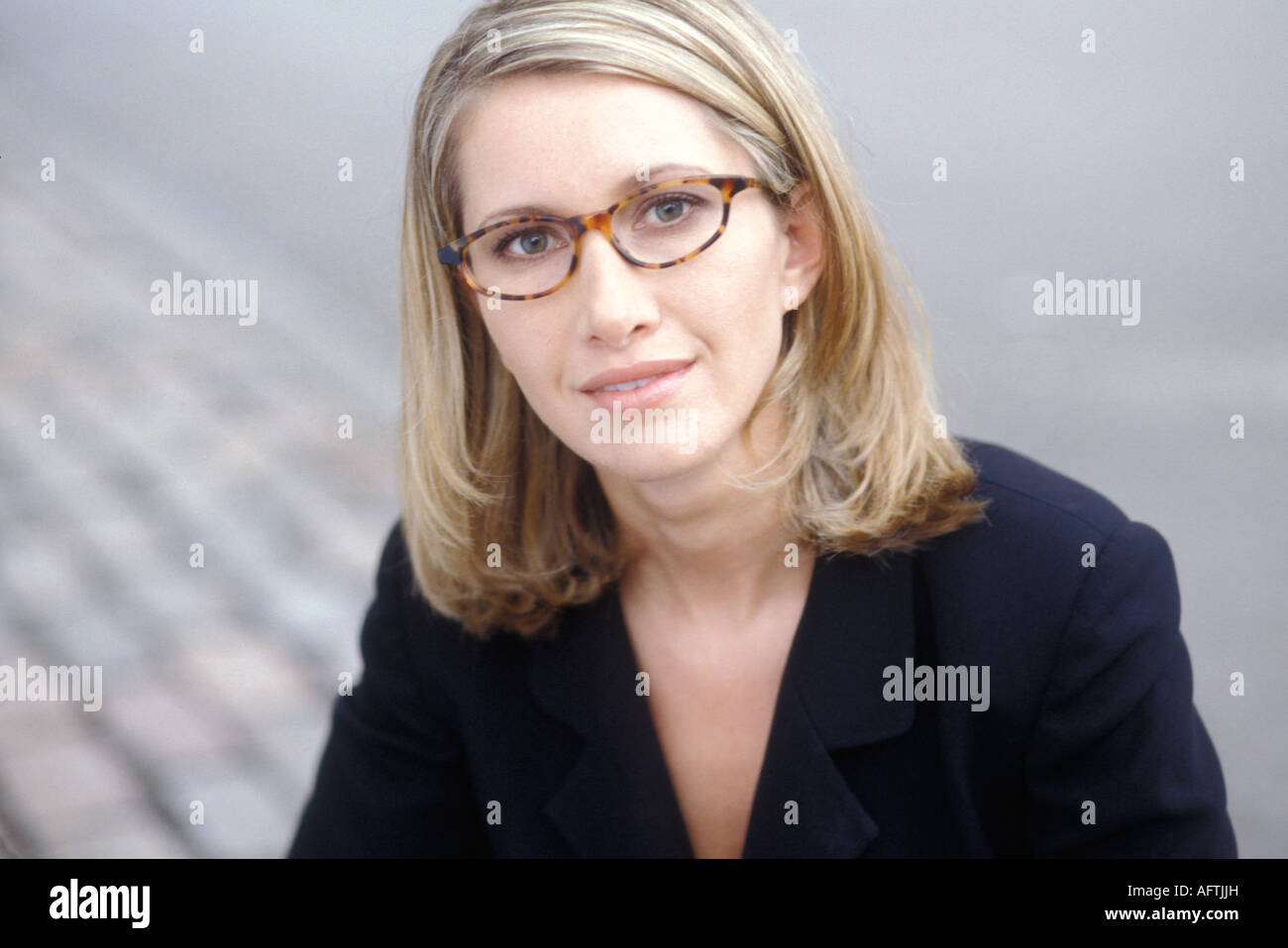 Young businesswoman staring, portrait Stock Photo - Alamy