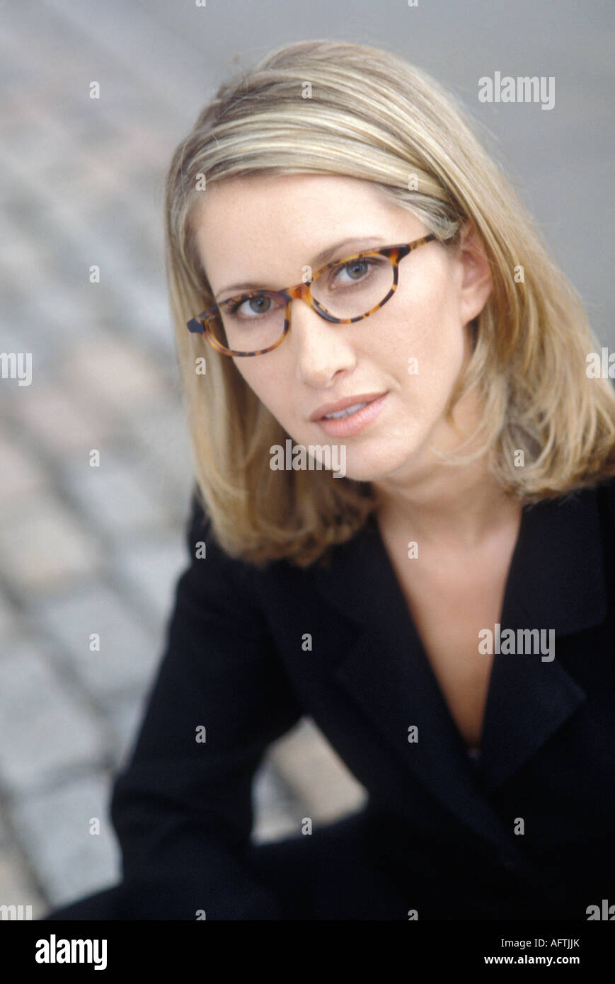 Young businesswoman staring, portrait Stock Photo - Alamy