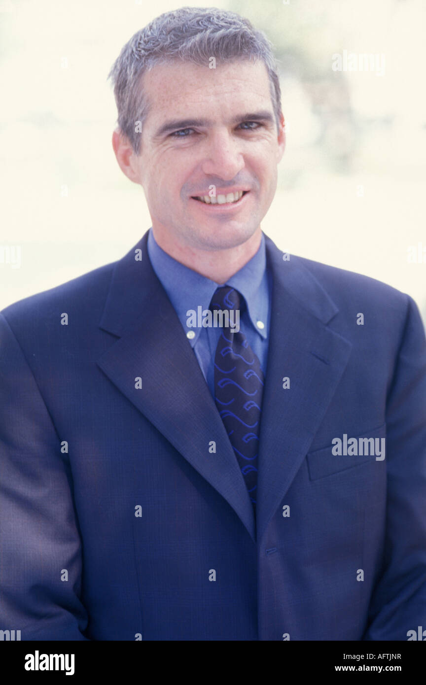 Young businessman smiling, portrait Stock Photo - Alamy