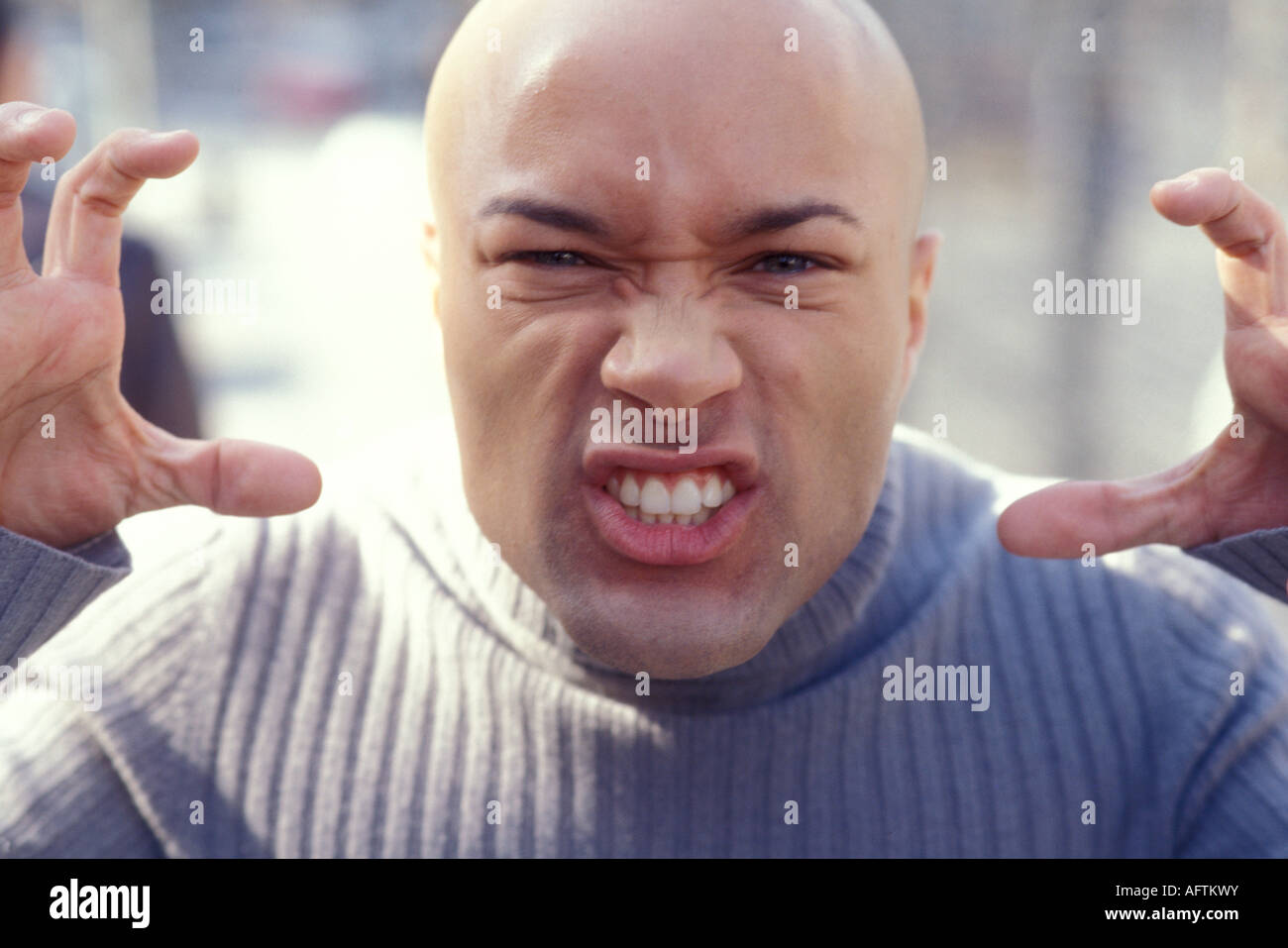 Young man making face, portrait Stock Photo - Alamy